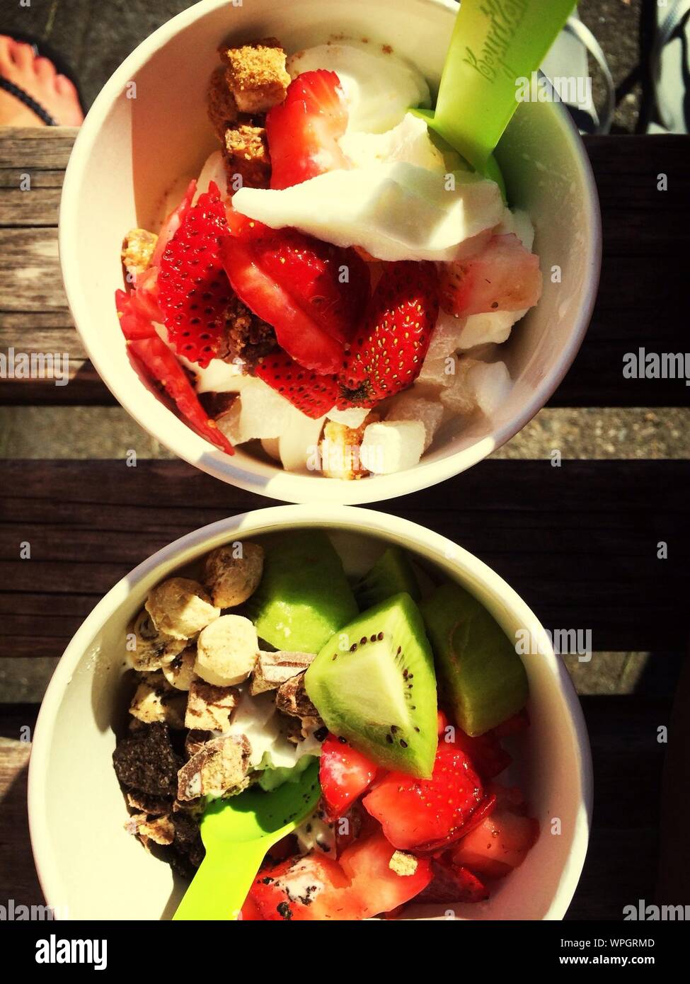 Two Bowls Of Crunchy Muesli With Fresh Fruits Stock Photo - Alamy