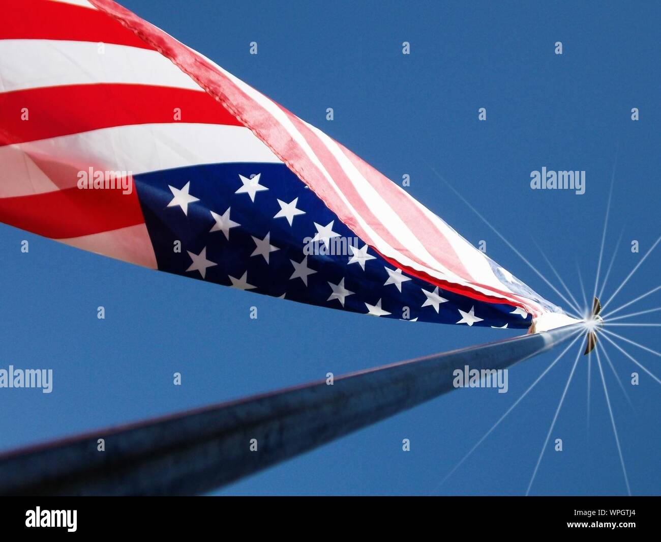 Flag clear sky hi-res stock photography and images - Alamy