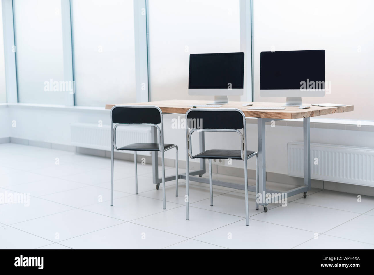 computer Desk for clients in the lobby of the Bank Stock Photo - Alamy