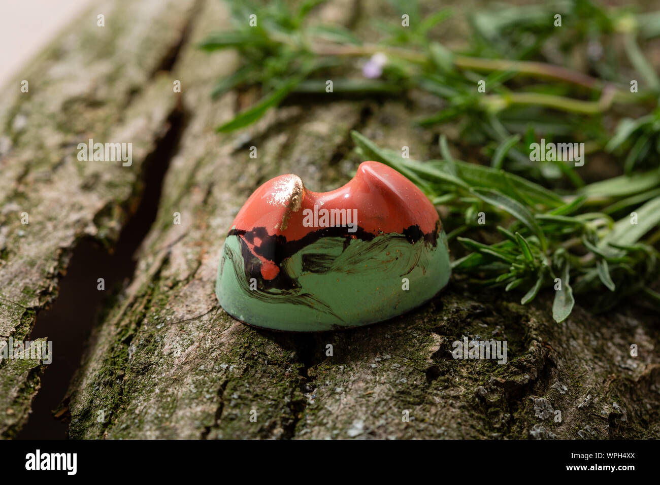 Modern candies on wood backdrop, sweet food Stock Photo - Alamy
