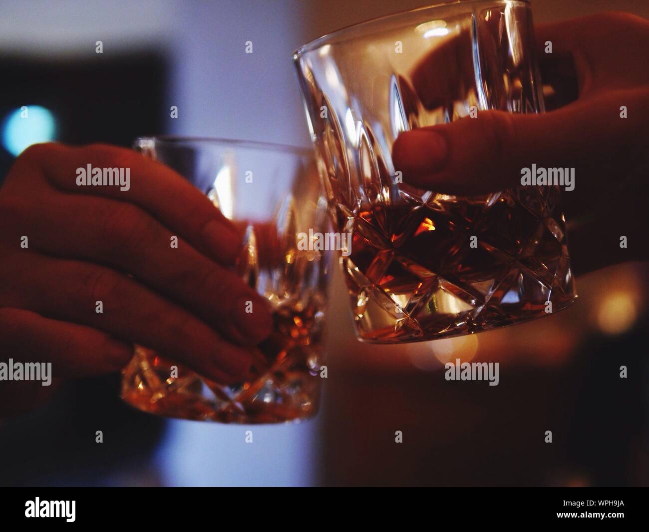 Shot glasses clinking hi-res stock photography and images - Alamy