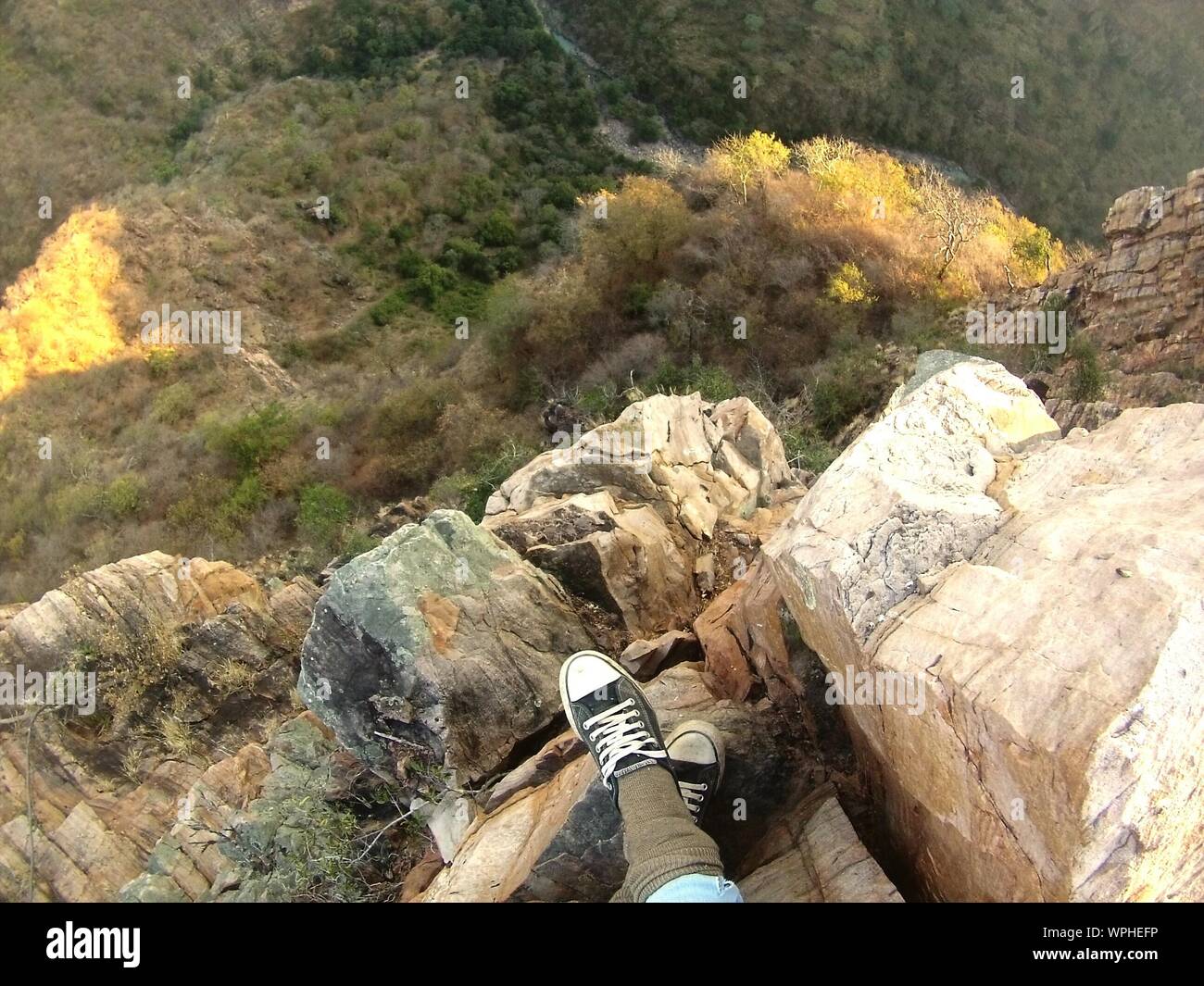Standing on cliff edge hi-res stock photography and images - Alamy