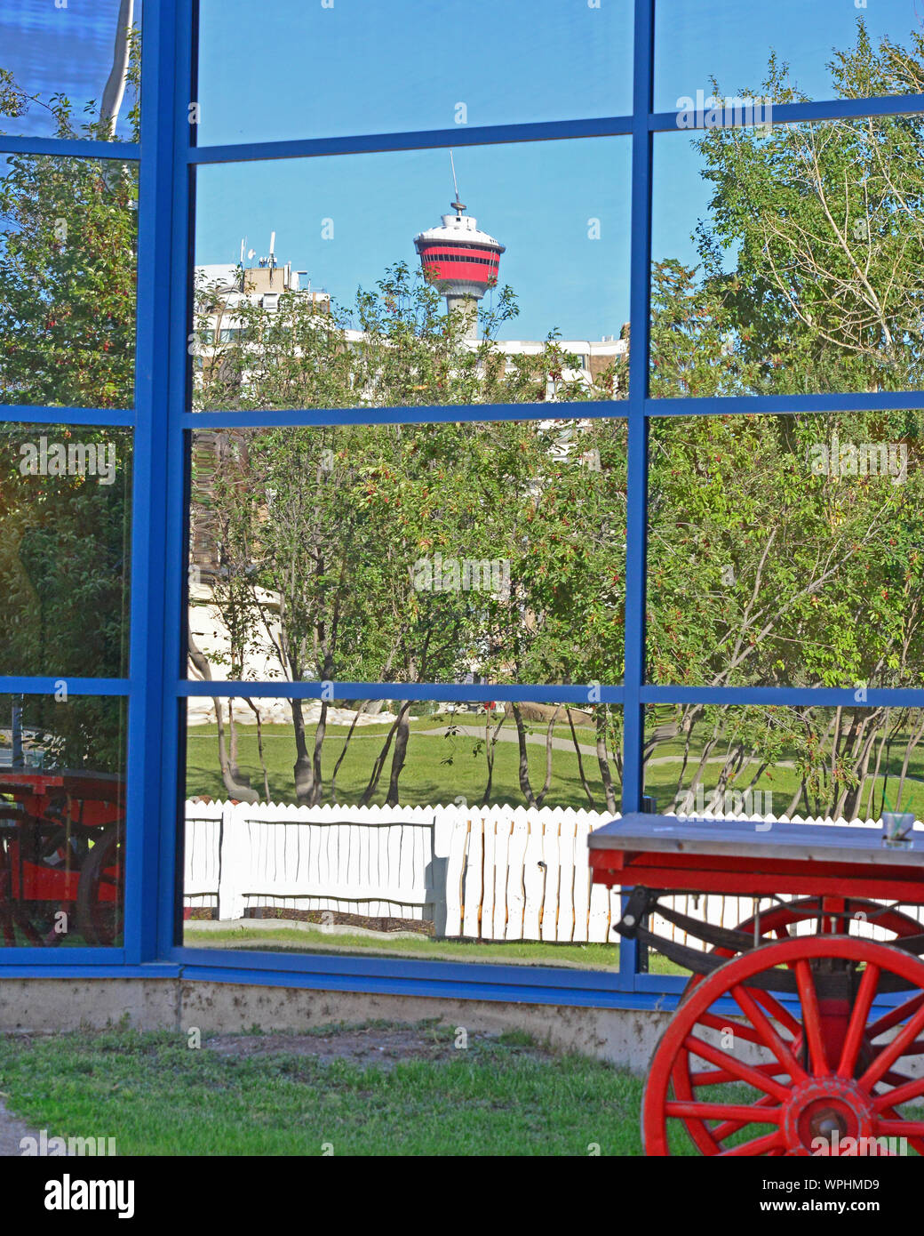 Calgary tower refelcted in the window of the Fort Calgary museum. The ...