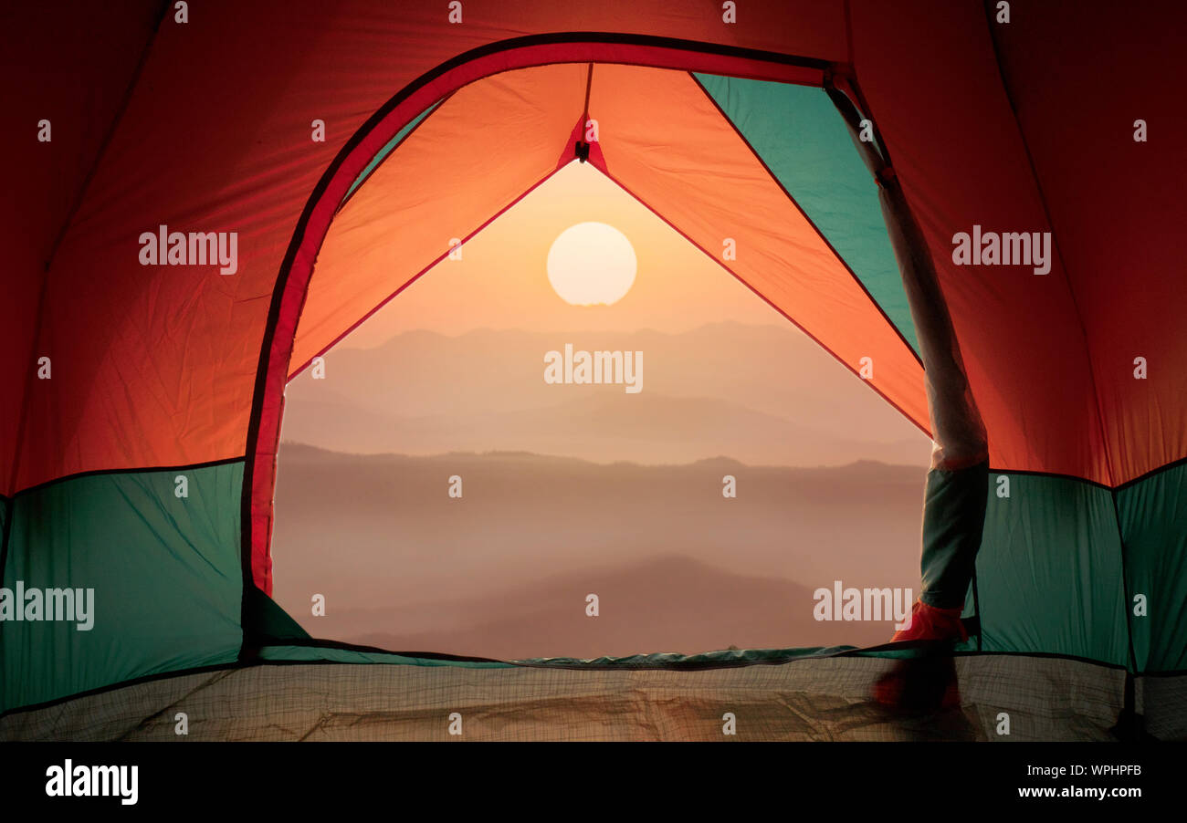 Tent view on window with sunset or sunrise background Stock Photo - Alamy