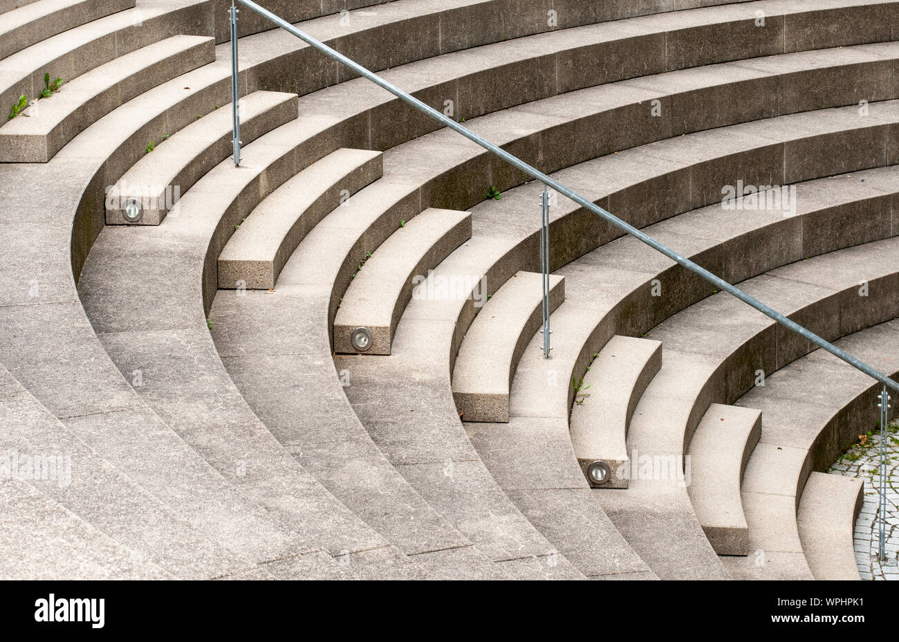 concrete stairway arranged in circles forming amphitheatre shape ...