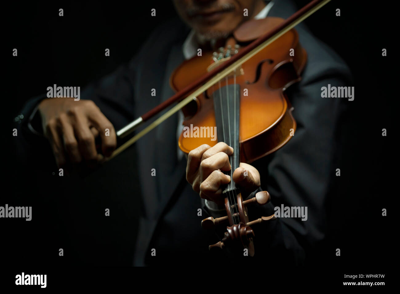 string instrument "violin" on wood background Stock Photo - Alamy