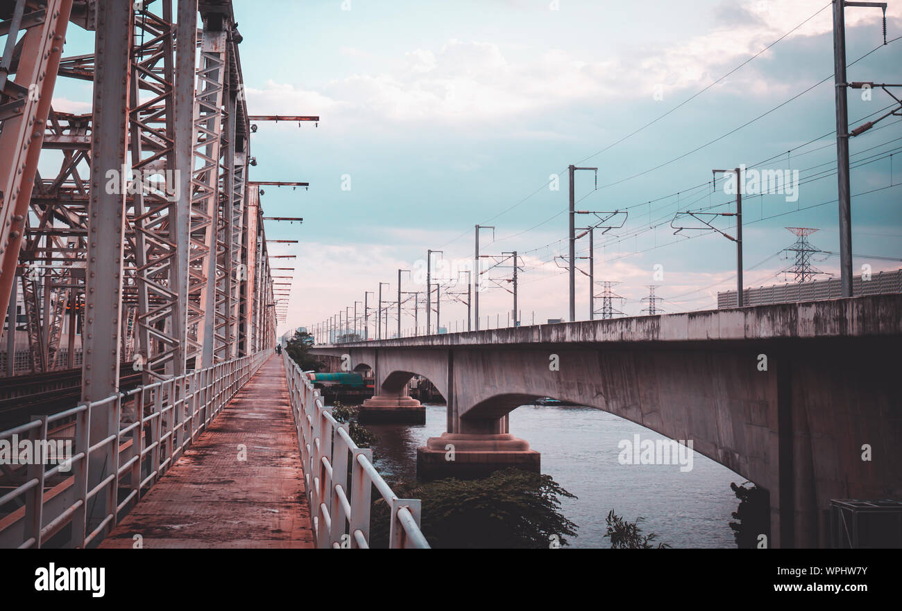 Walkway next Railroad and beautiful sky at sunset in summer. Rural ...