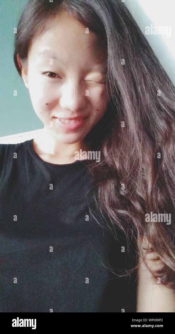 Winking eyes hi-res stock photography and images - Alamy