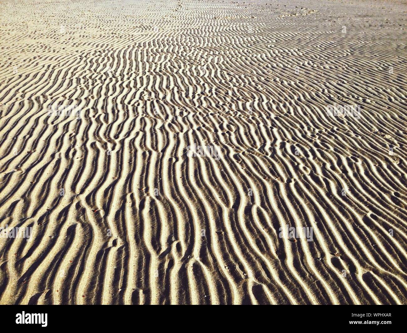 Wave patterns beach hi-res stock photography and images - Alamy
