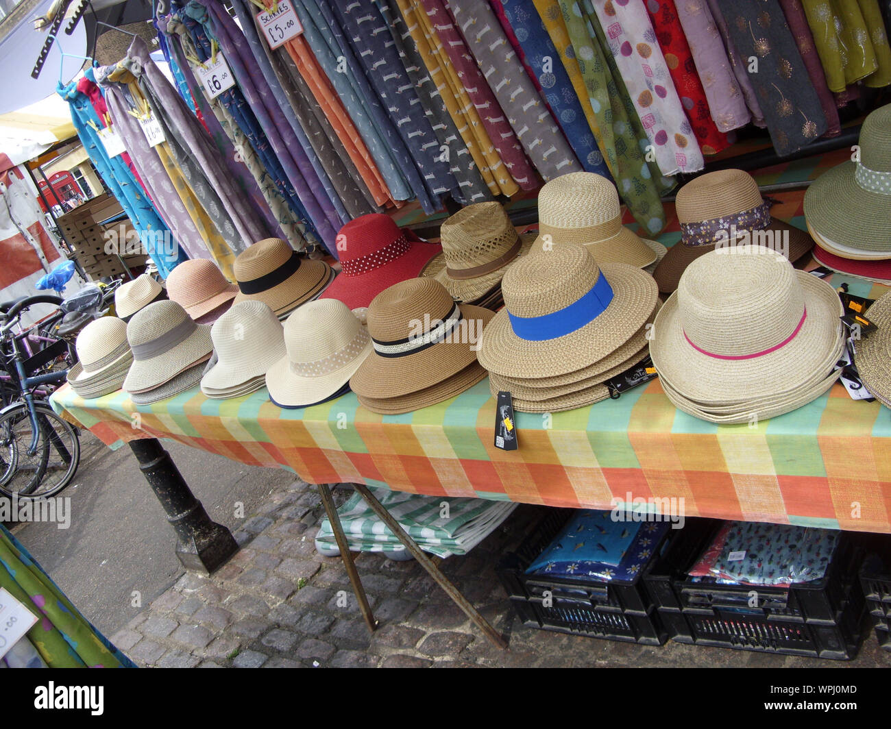 Market stall selling Hats Stock Photo - Alamy