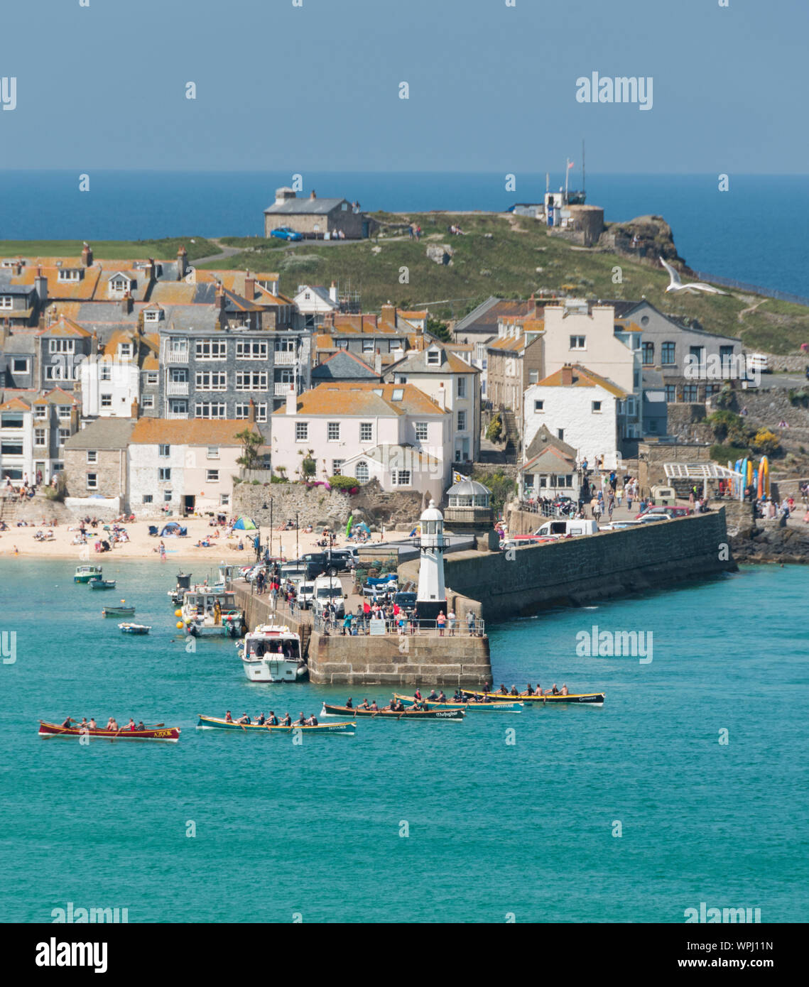 The busy harbour of St Ives, Cornwall on a gig racing day Stock Photo ...