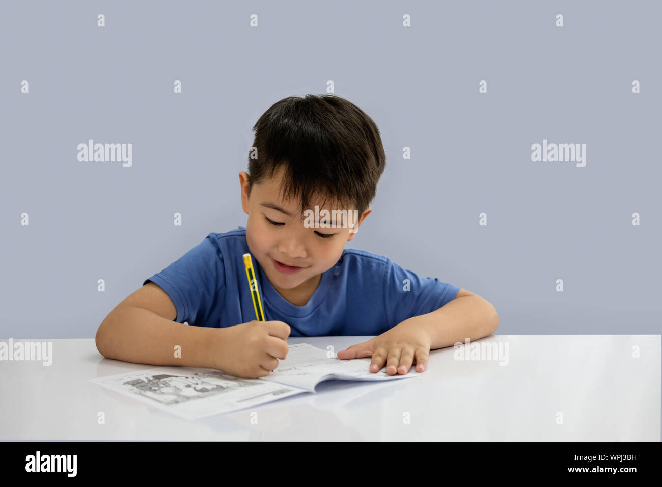Boy sitting on examination table hi-res stock photography and images ...