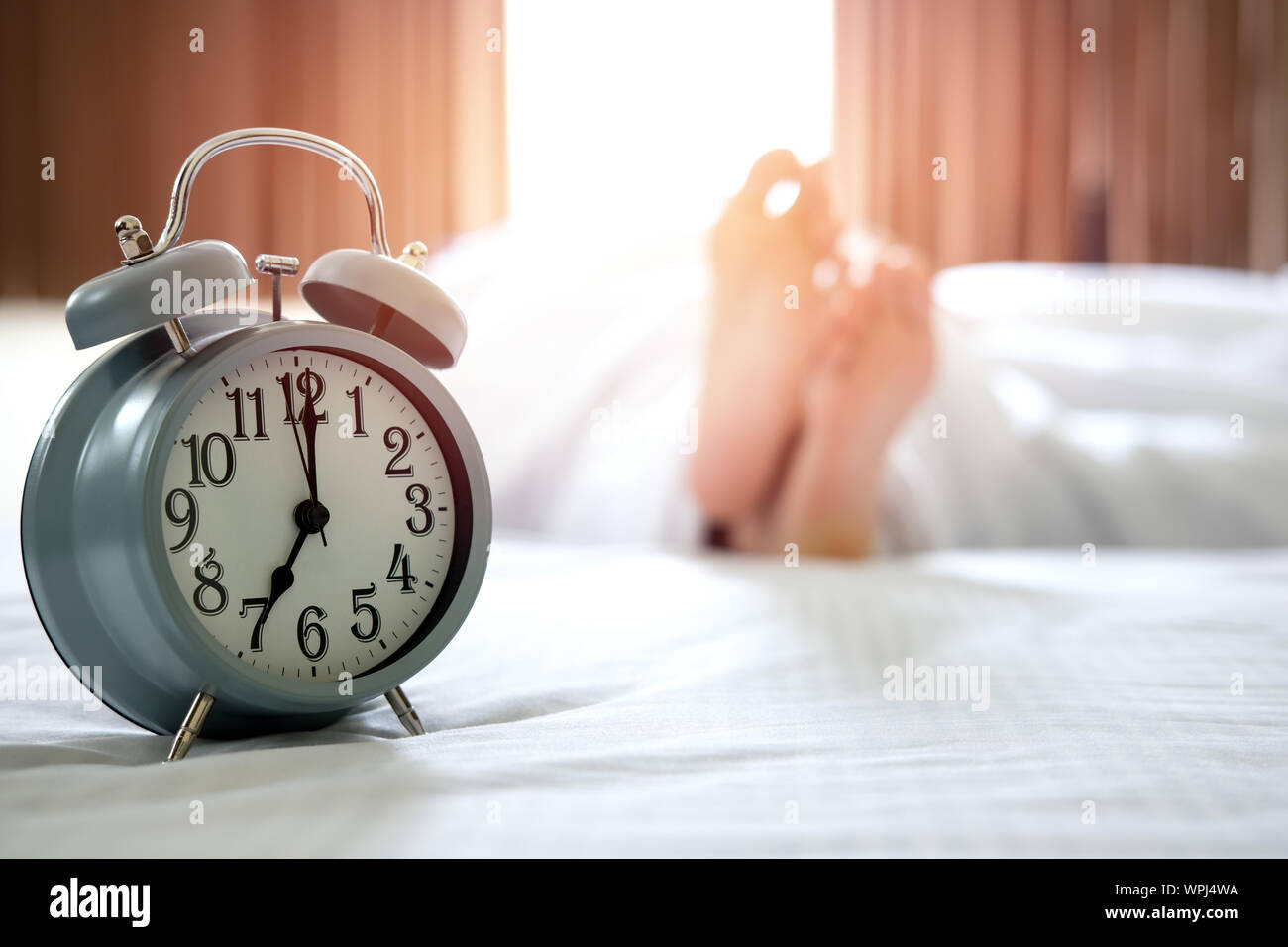 The foot that emerges from the blanket and alarm clock in the morning ...