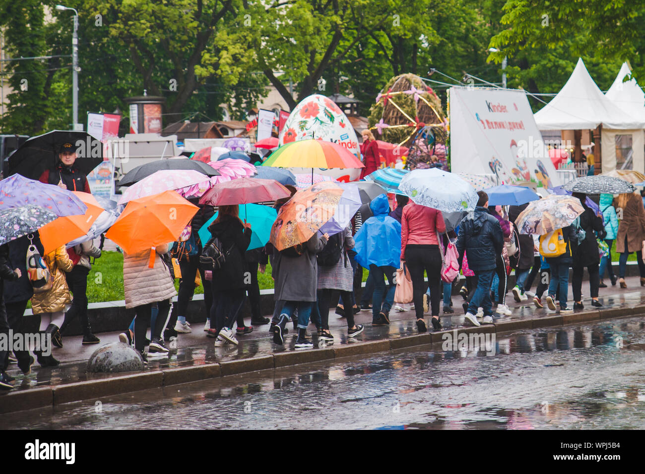 LVIV, UKRAINE - May 5, 2019: group of kids walking by street with ...