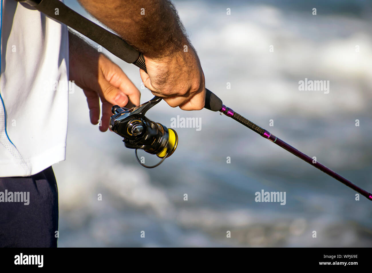 Reeling In A Fish High Resolution Stock Photography and Images - Alamy