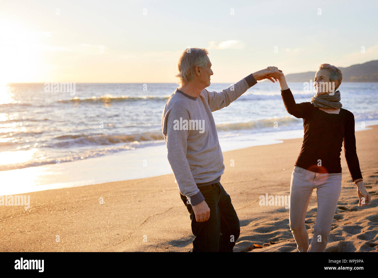 Old man beach dancing hi-res stock photography and images - Alamy