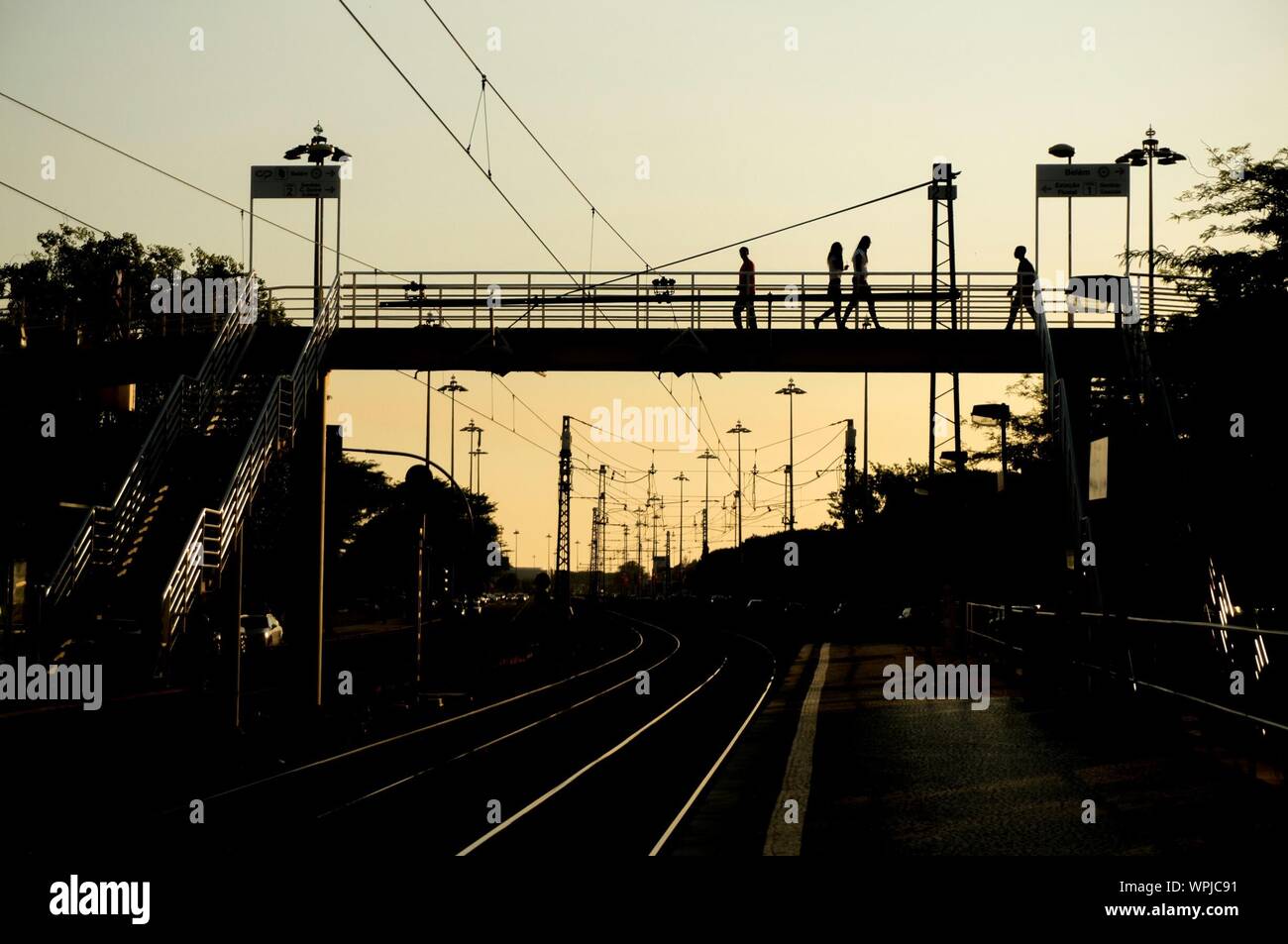 People walking on railroad bridge hi-res stock photography and images ...