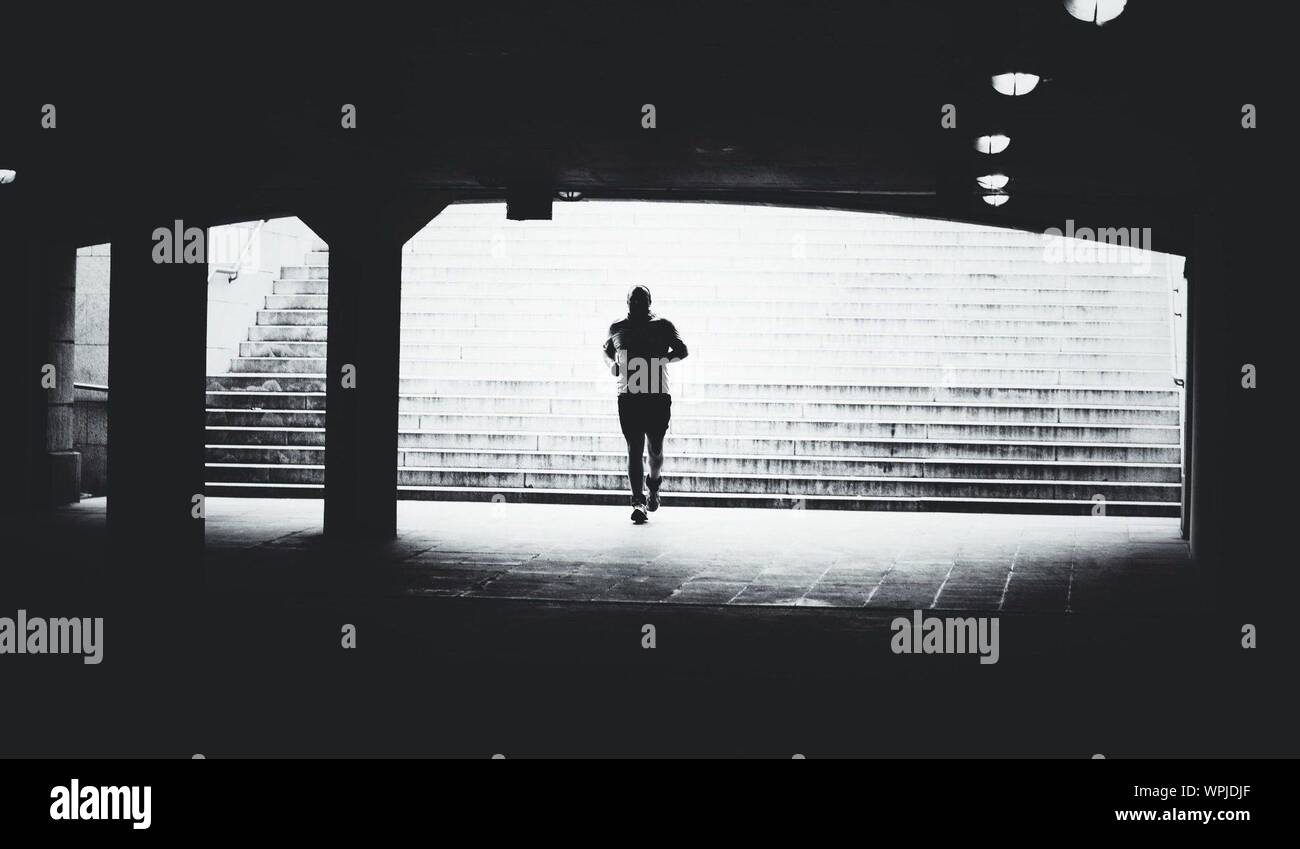 Healthy man running steps hi-res stock photography and images - Alamy