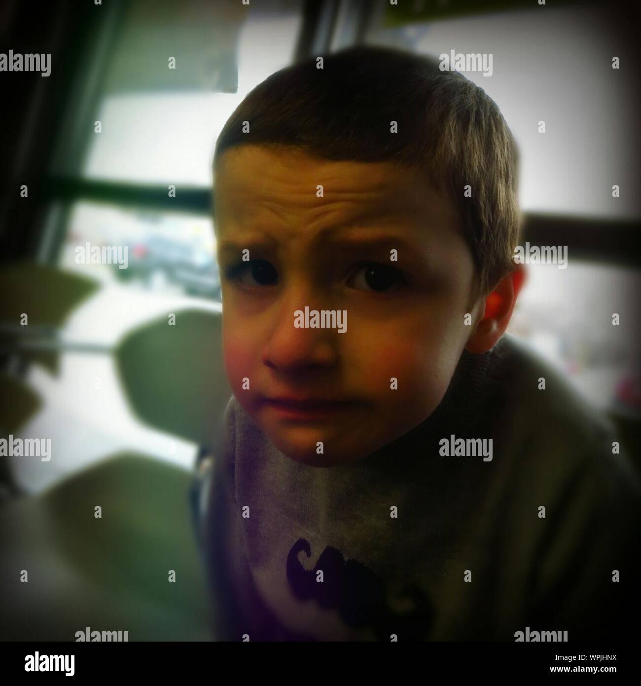 Person grimacing hi-res stock photography and images - Alamy