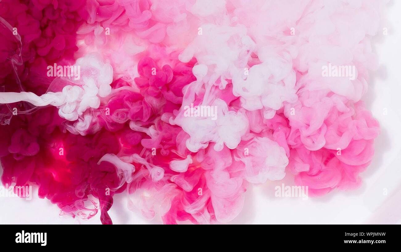 Ink in water pink hi-res stock photography and images - Alamy