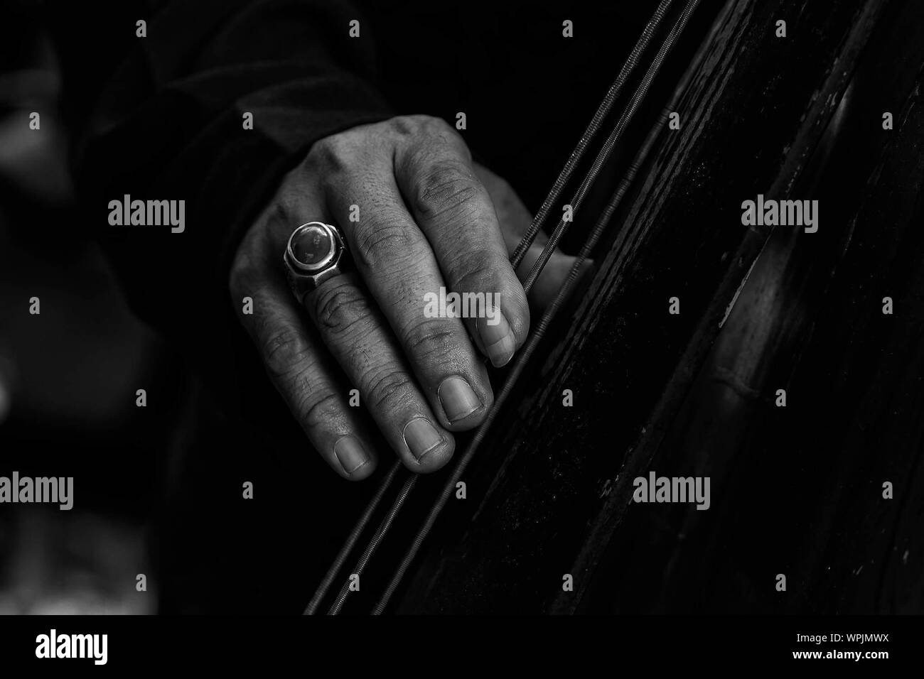 Close up hands playing instrument hi-res stock photography and images ...