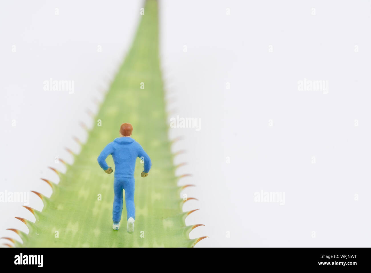 miniature people running Stock Photo - Alamy