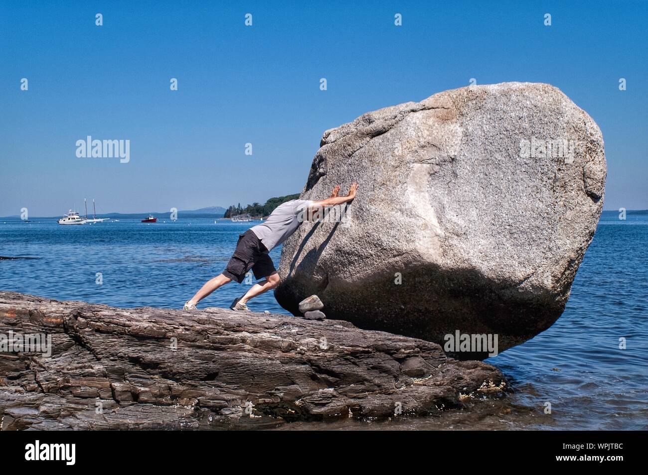 Man at rock hi-res stock photography and images - Alamy