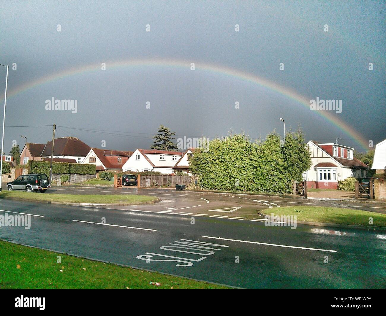 Rainbow And Houses High Resolution Stock Photography and Images - Alamy