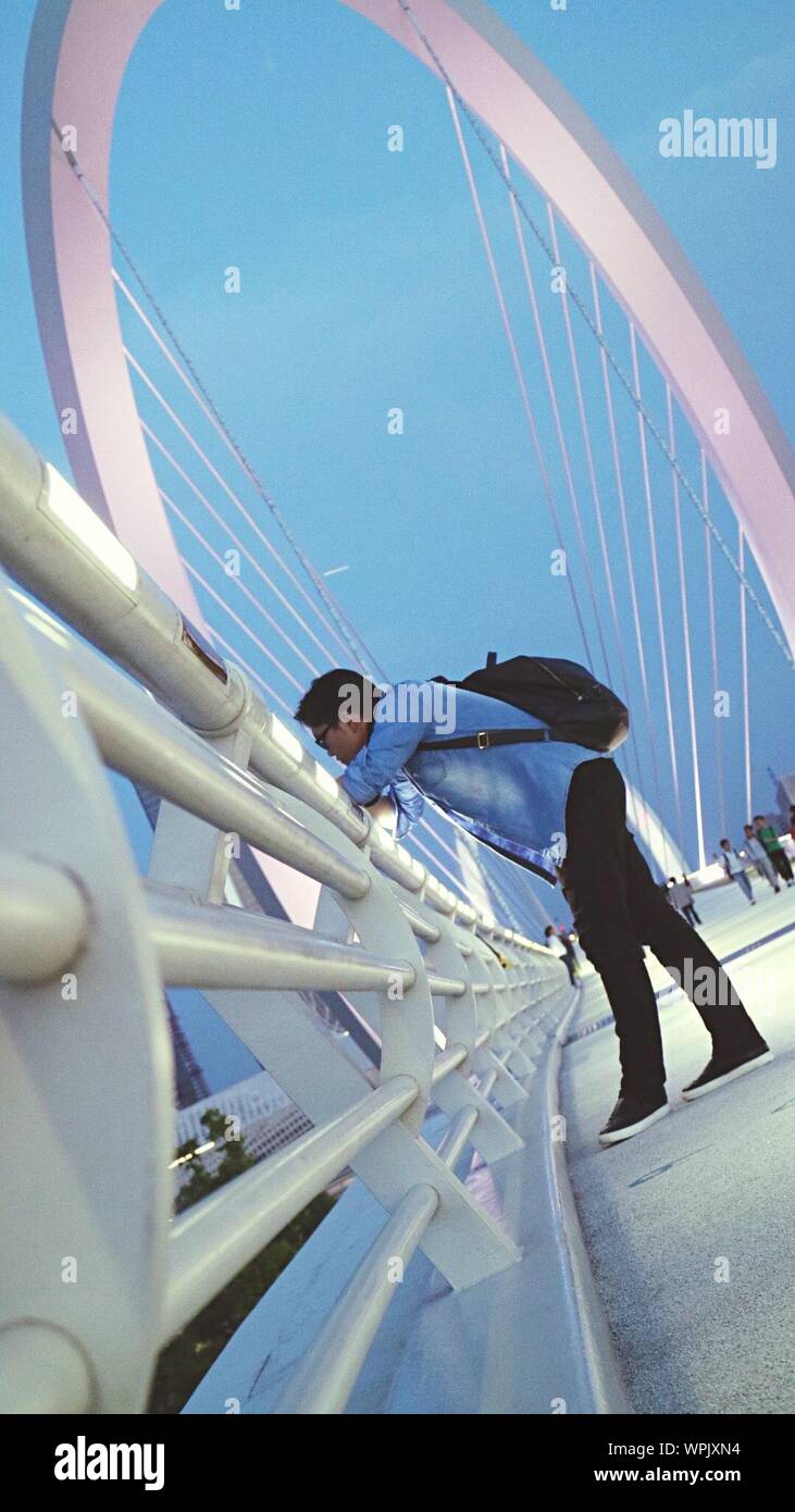 Man Leaning On Bridge Railing High Resolution Stock Photography and ...