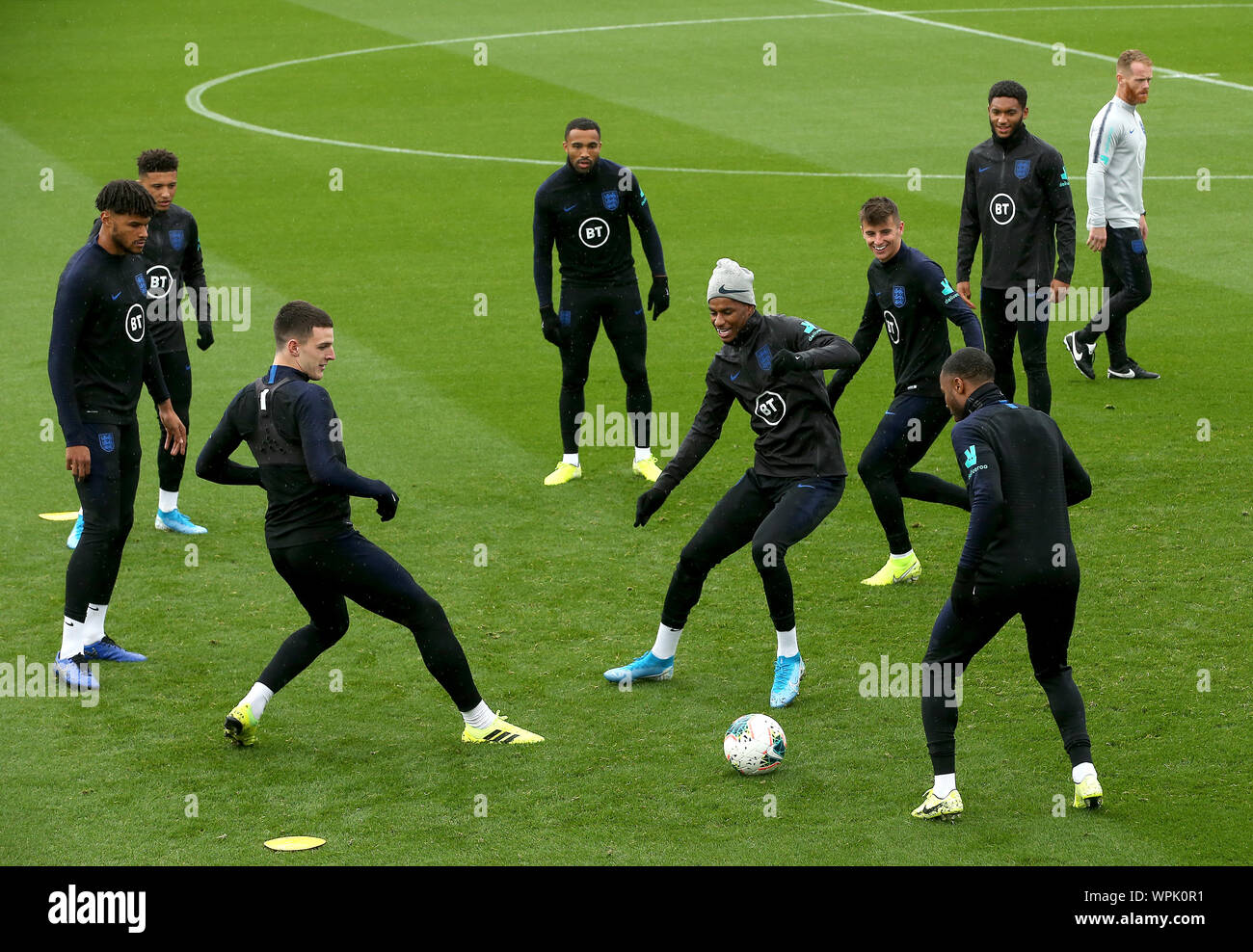 England's Marcus Rashford (centre) and his team-mates during a training ...