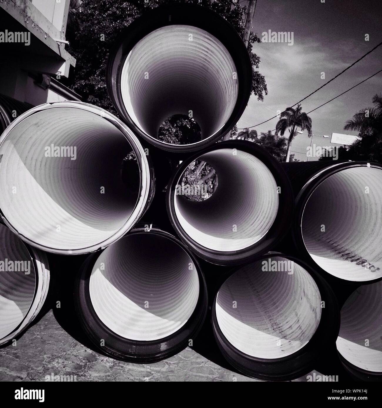 Stack Of Pipes On Street Stock Photo - Alamy