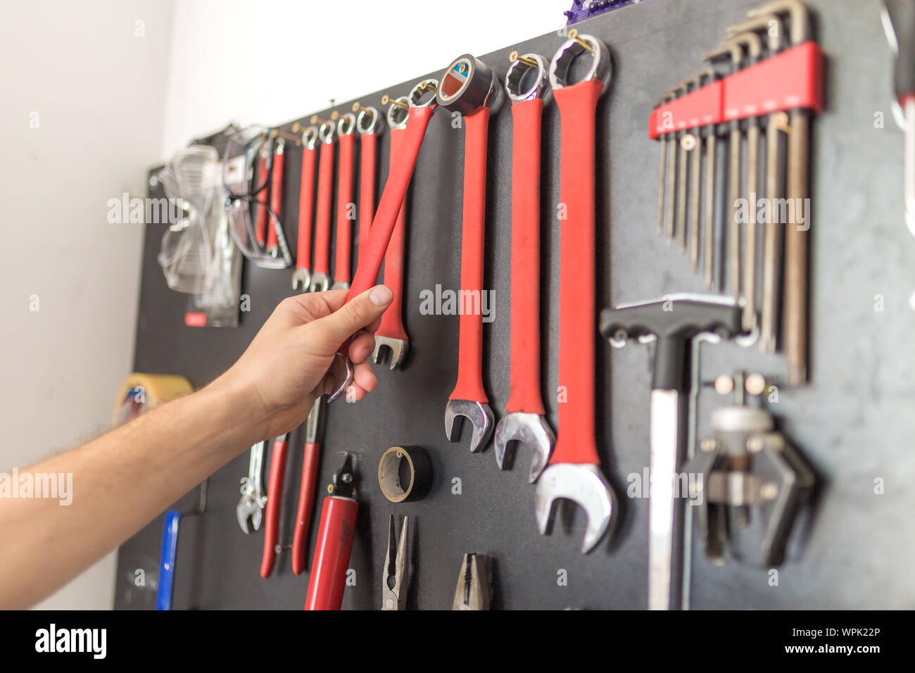 Picking up work tools hi-res stock photography and images - Alamy