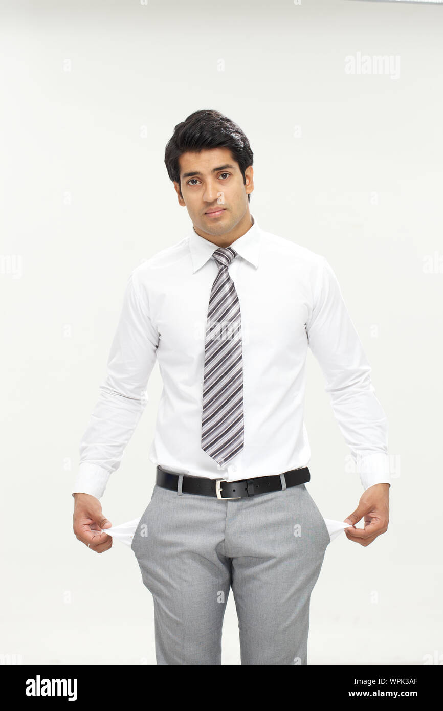 Indian man showing empty pockets hi-res stock photography and images ...