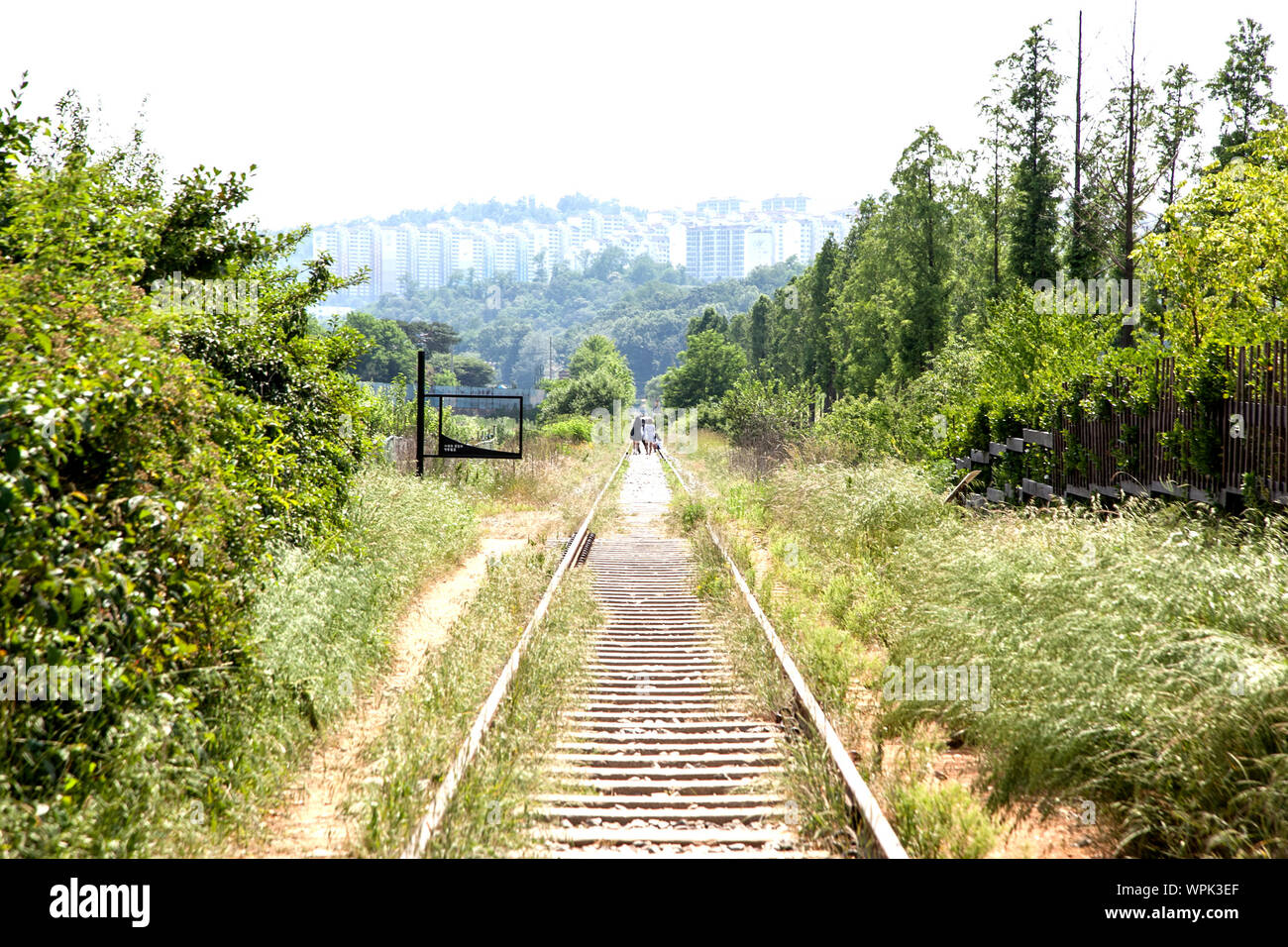 People walking on the railway track hi-res stock photography and images ...