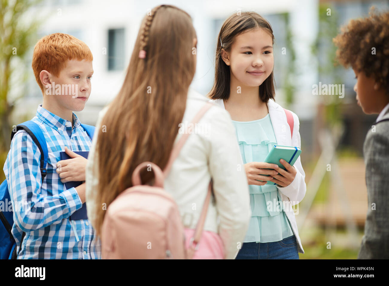 Elementary Students Talking To Each Other