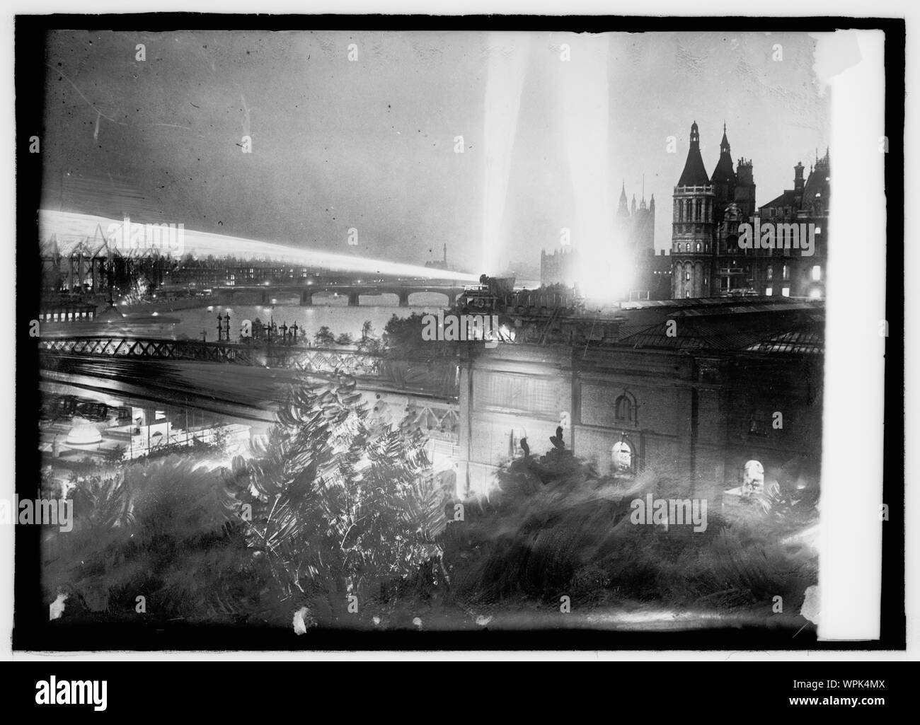 London searchlights, Thames River and Parliament Bldg Stock Photo - Alamy