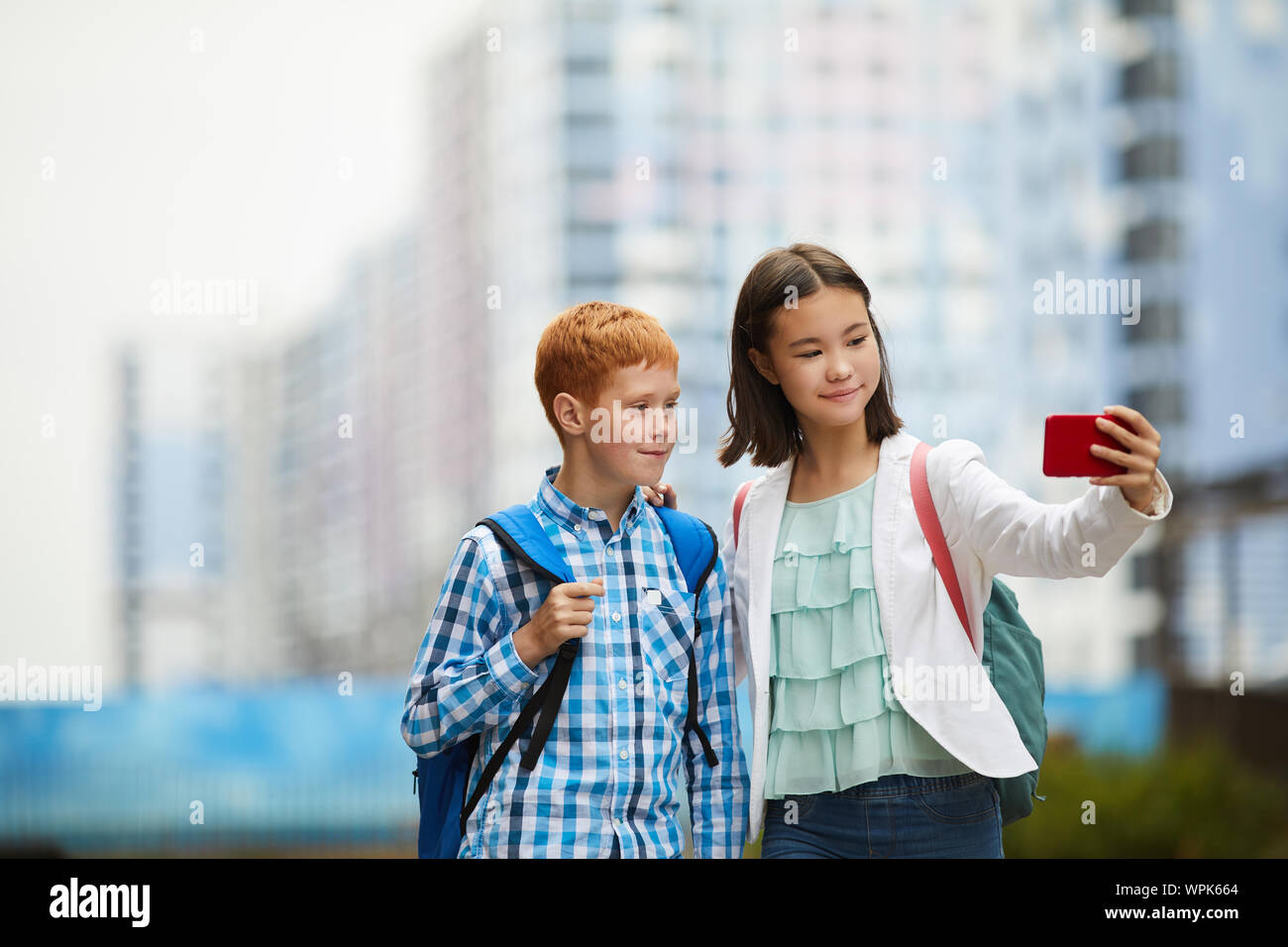 Standing up backs behind hi-res stock photography and images - Alamy