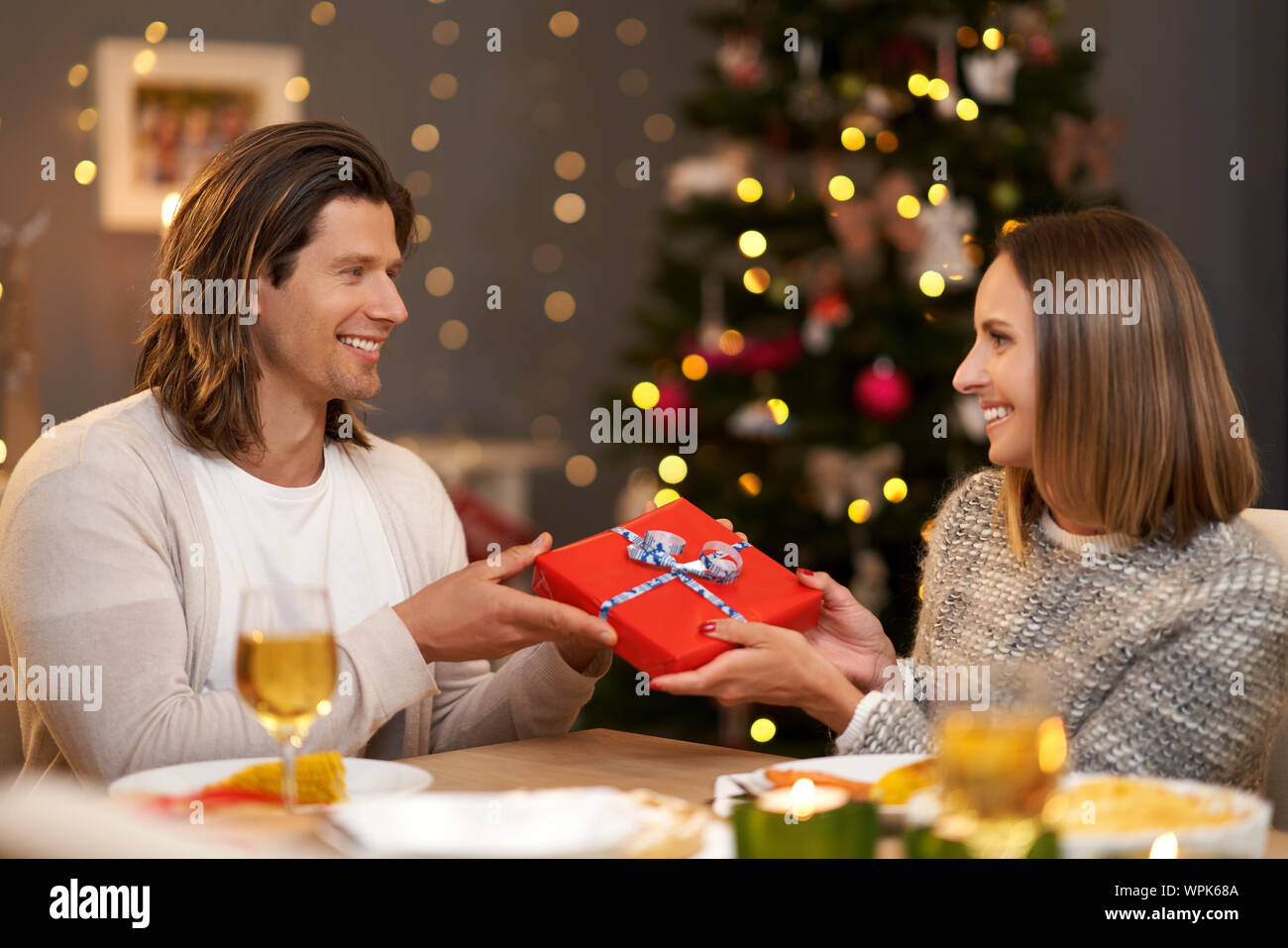 Beautiful couple decorated tree hi-res stock photography and images - Alamy