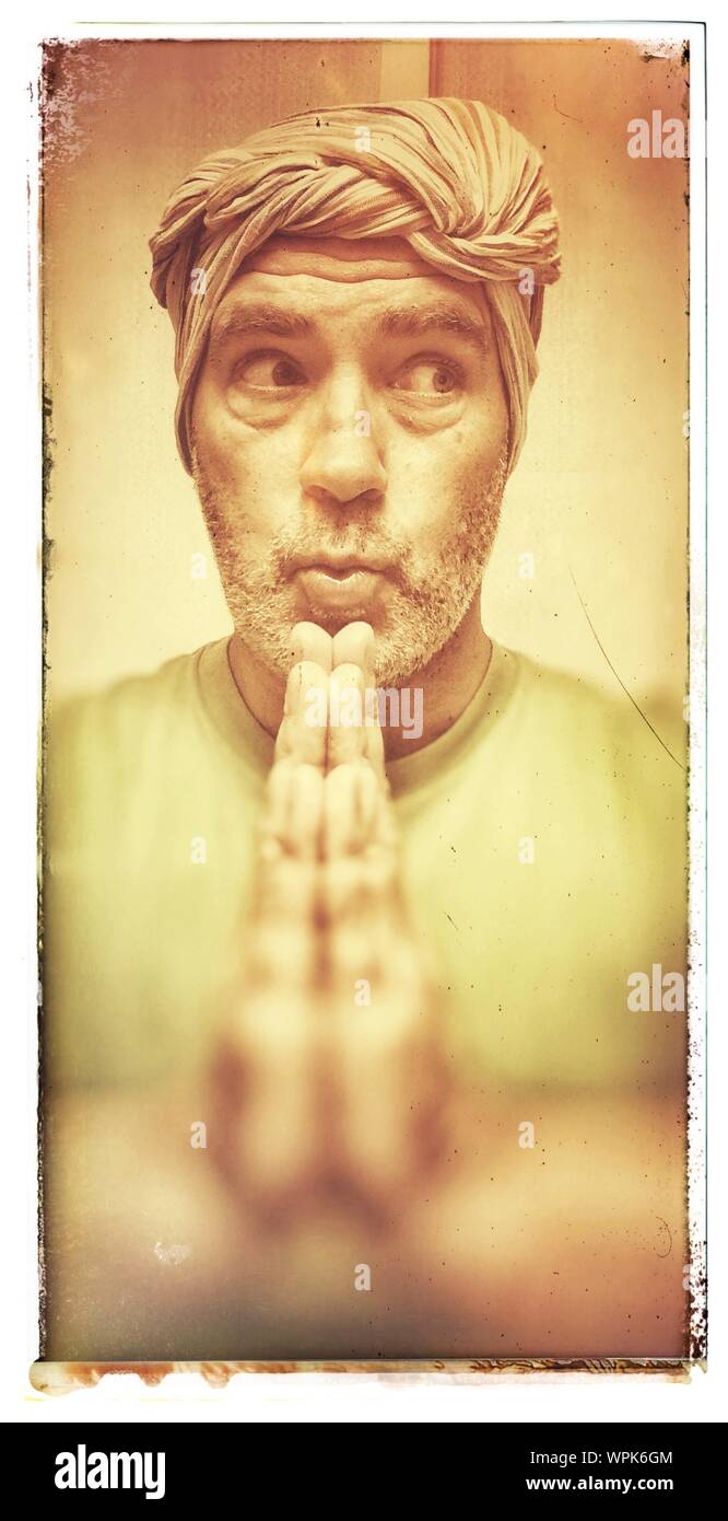 Monk or priest praying Cut Out Stock Images & Pictures - Alamy