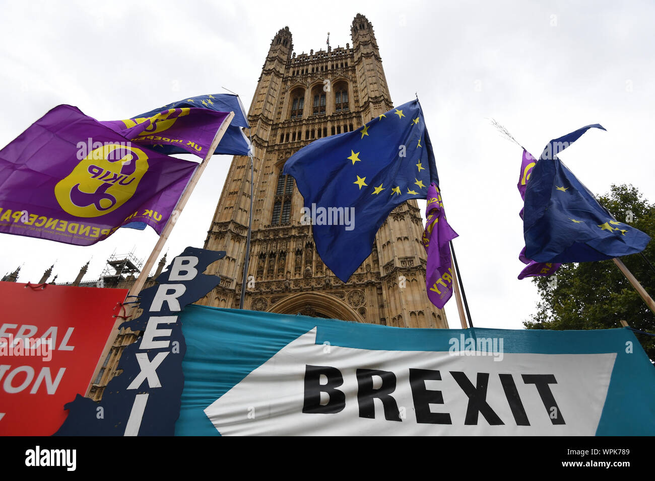 Flags outside the Houses of Parliament in London Stock Photo - Alamy
