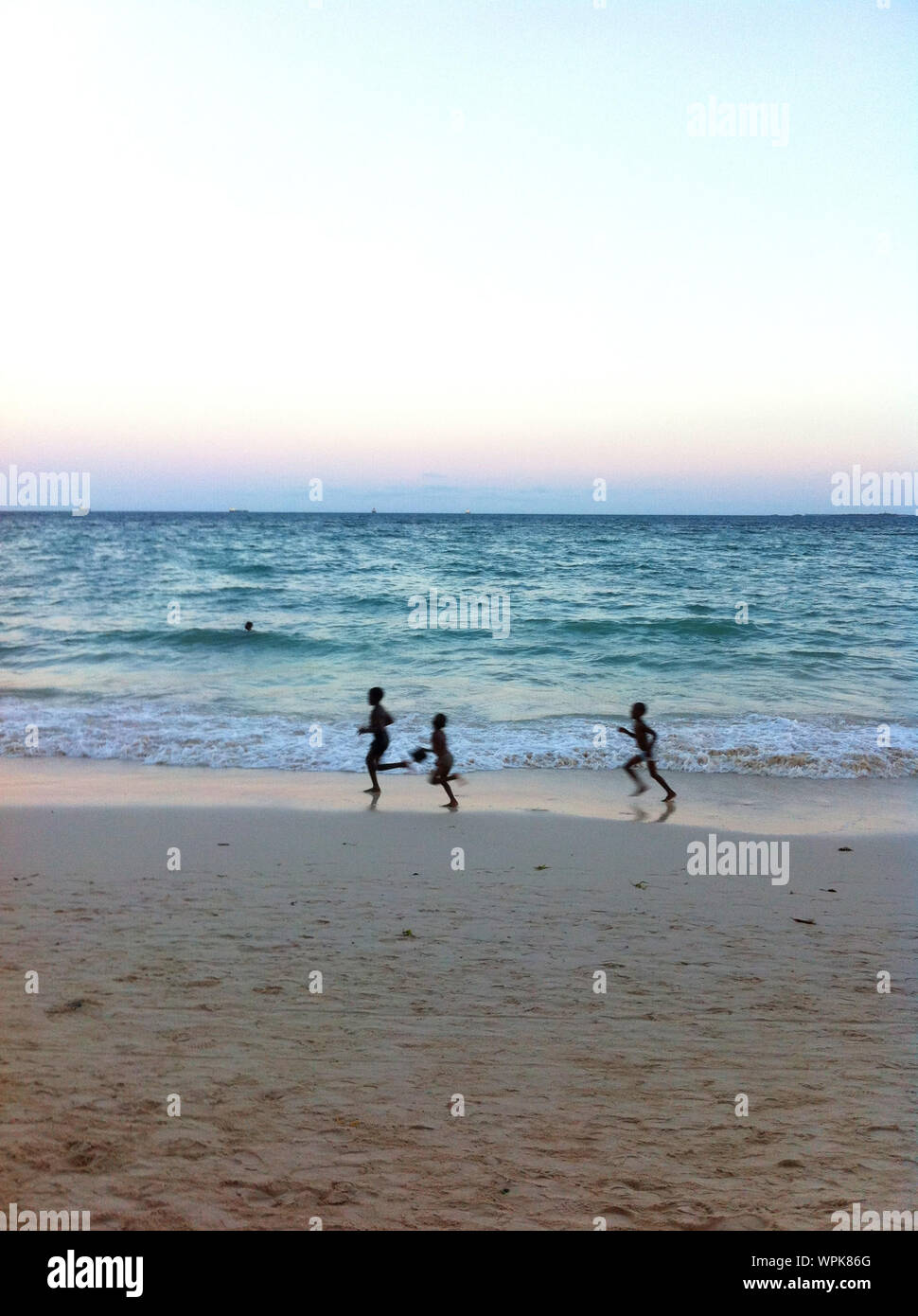 Three Children Boys Running On High Resolution Stock Photography and ...