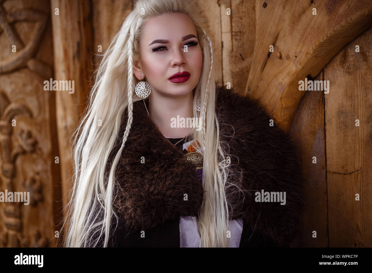 Outdoors portrait of beautiful furious scandinavian warrior ginger ...