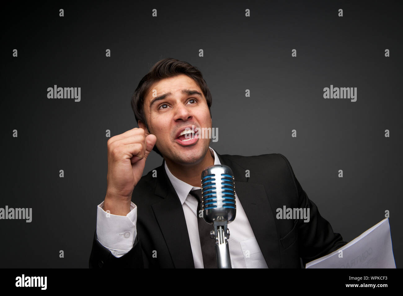 Television broadcaster shouting in newsroom Stock Photo - Alamy