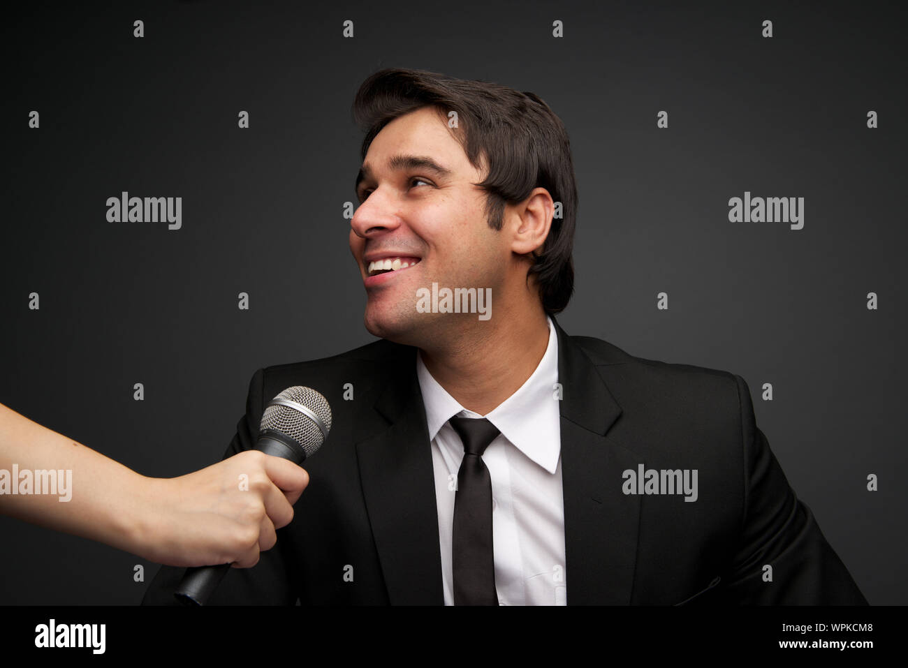 Business executive giving an interview Stock Photo - Alamy