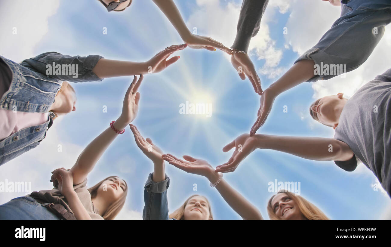 Conceptual symbol of cooperation diverse hands making a circle ...