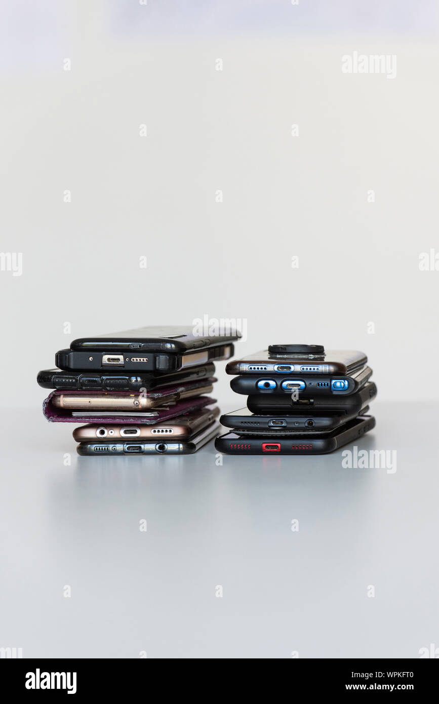 Stack of mobile phones in an office Stock Photo - Alamy