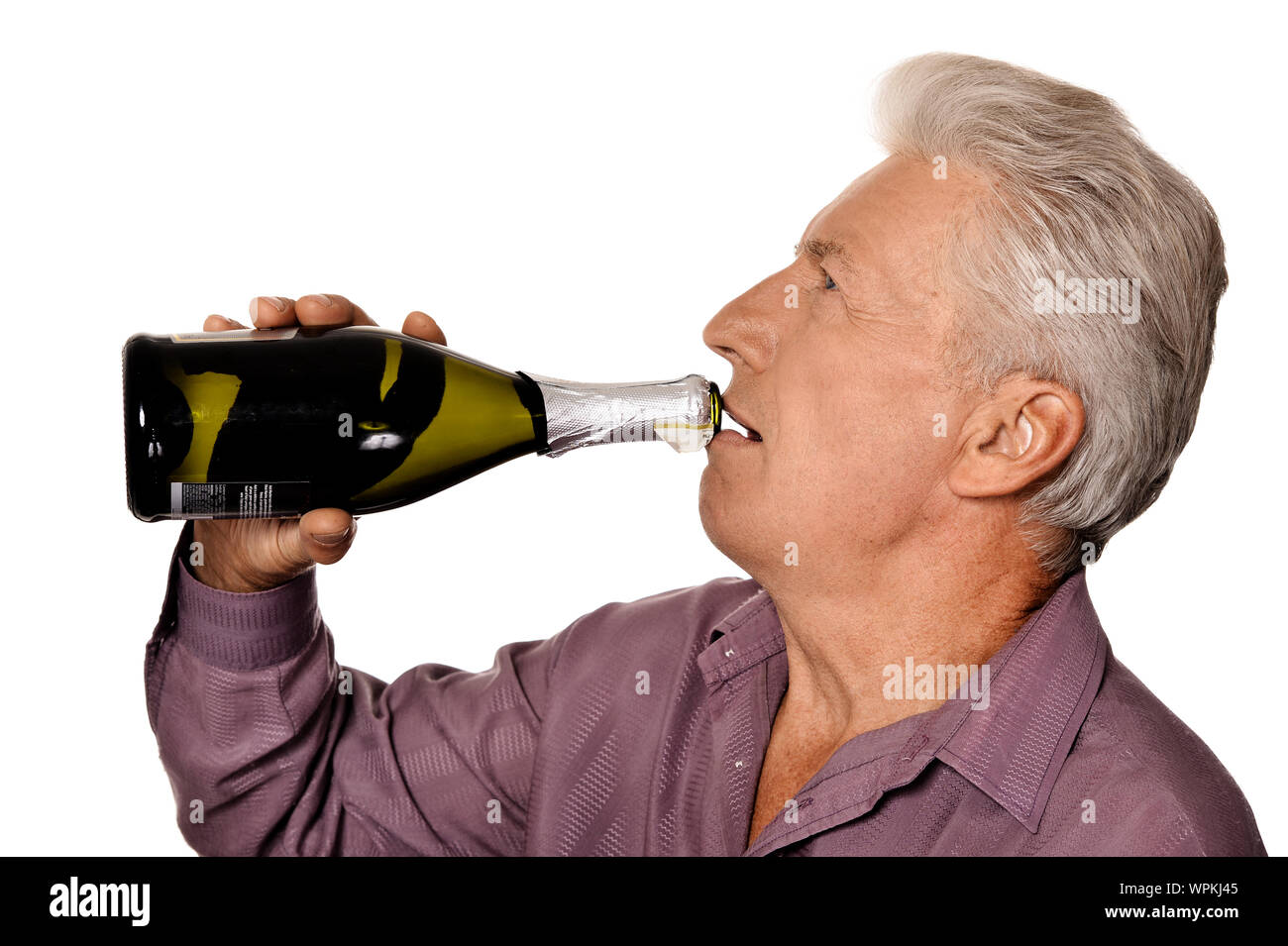 Portrait of handsome caucasian man drinking on white background Stock ...