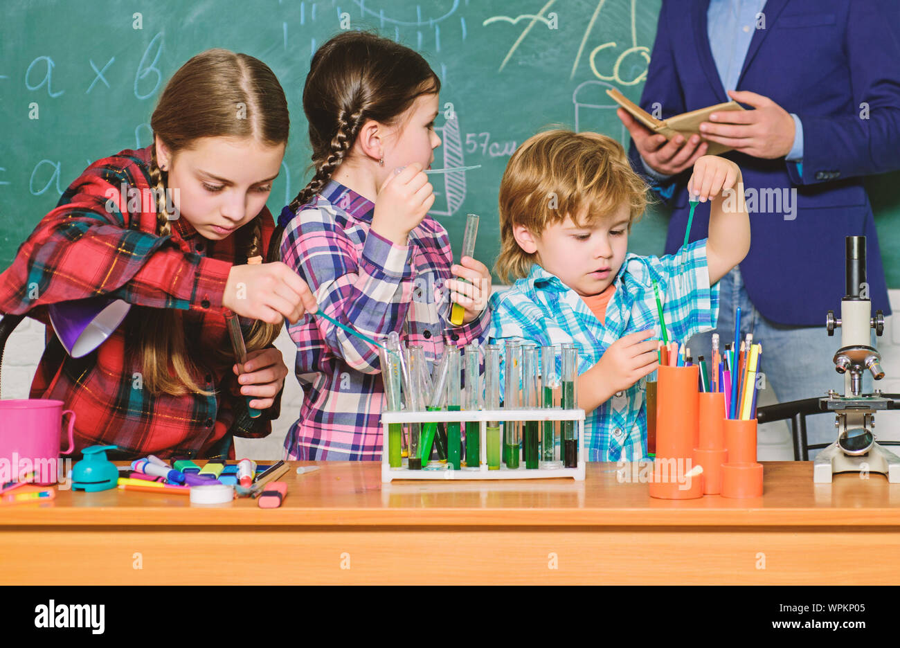 chemistry lab. back to school. happy children teacher. kids in lab coat ...