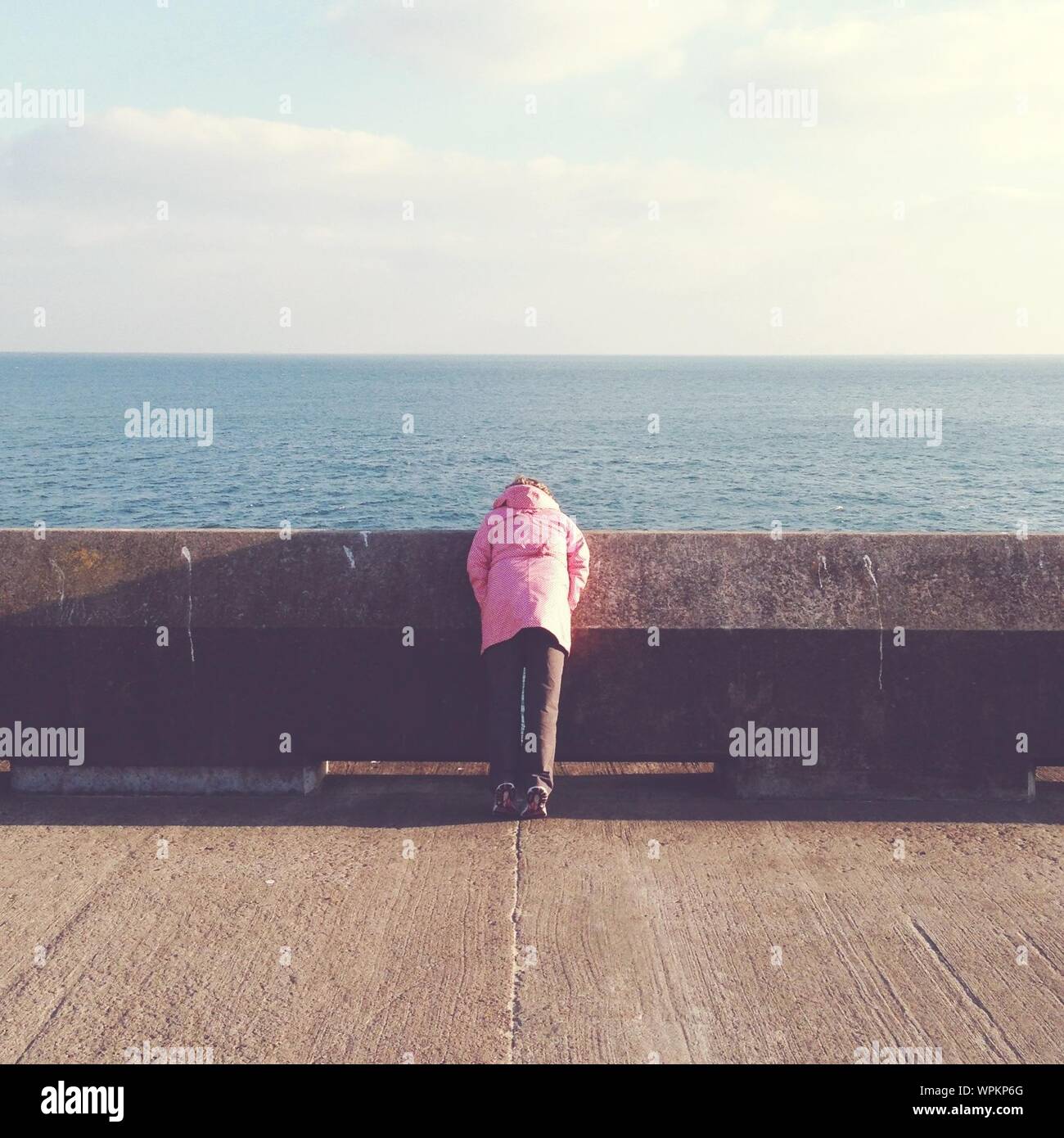 They are all leaning over hi-res stock photography and images - Alamy