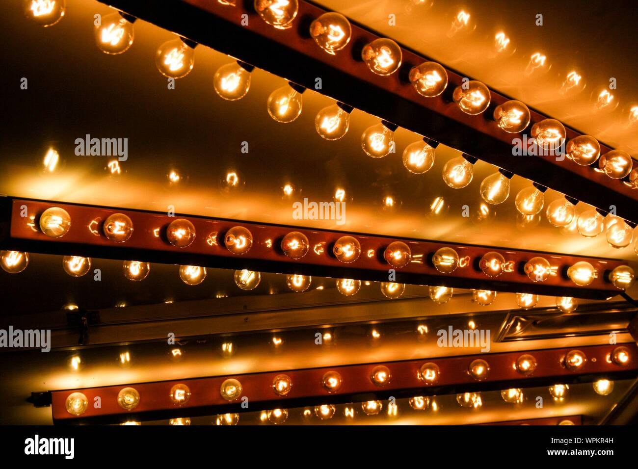 Illuminated row light bulbs ceiling ceiling hi-res stock photography ...